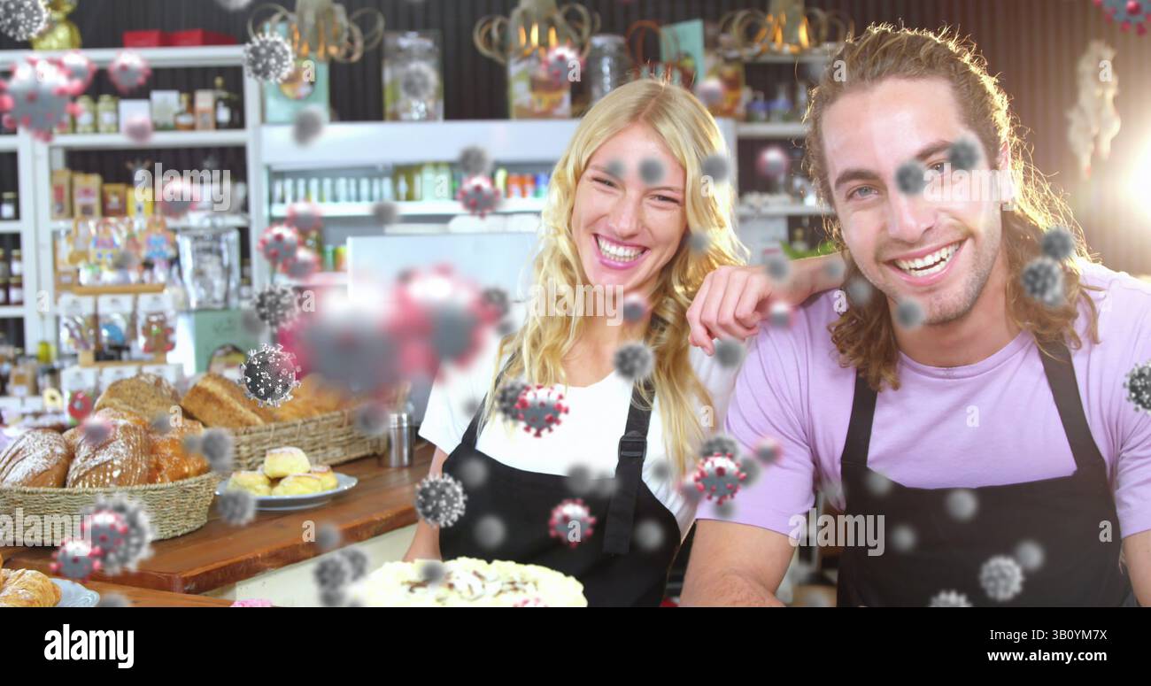 Smiling bakery staff arranging hi-res stock photography and images - Alamy