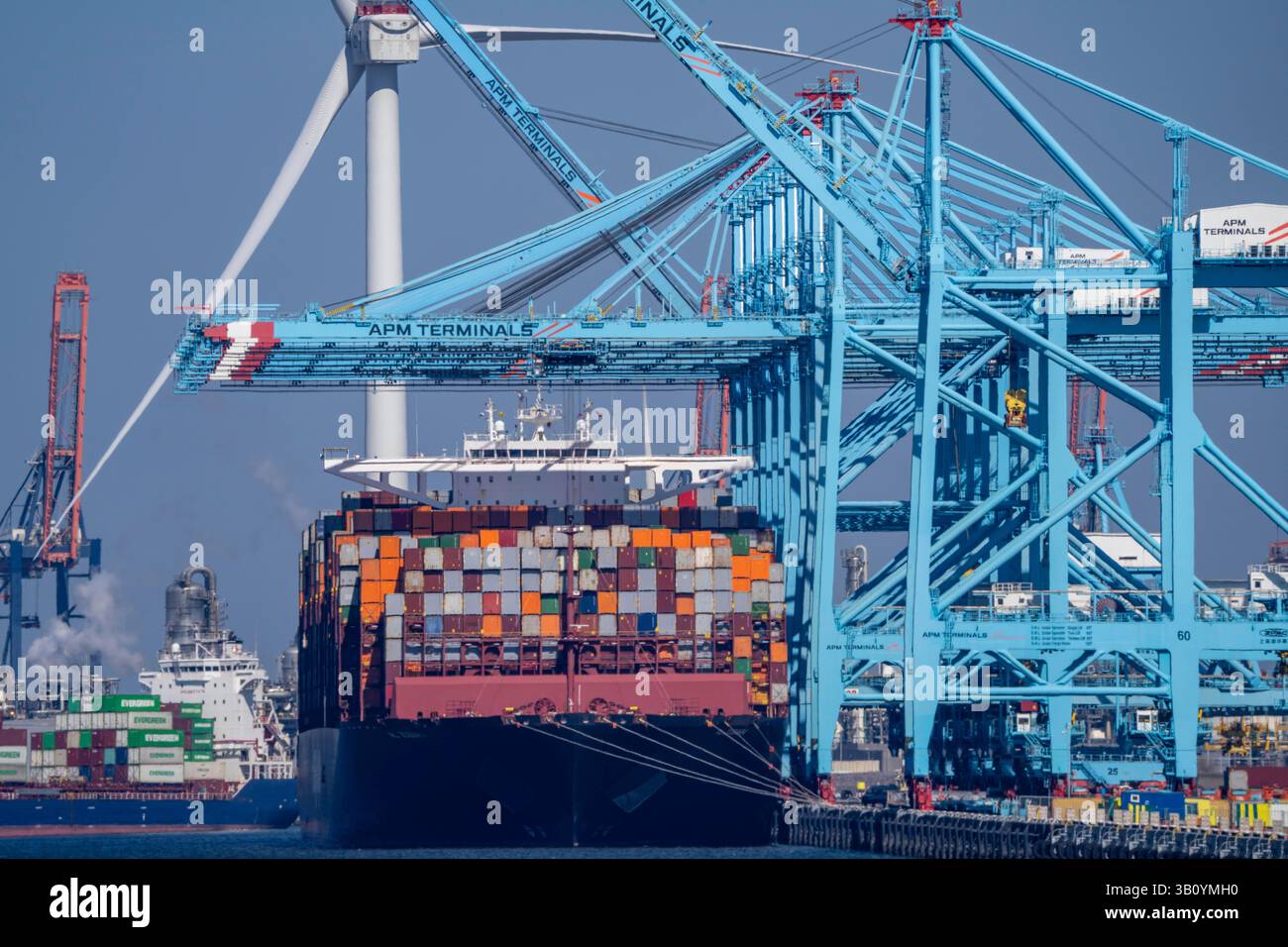 APM Container Terminal, container freighter being loaded and unloaded ...