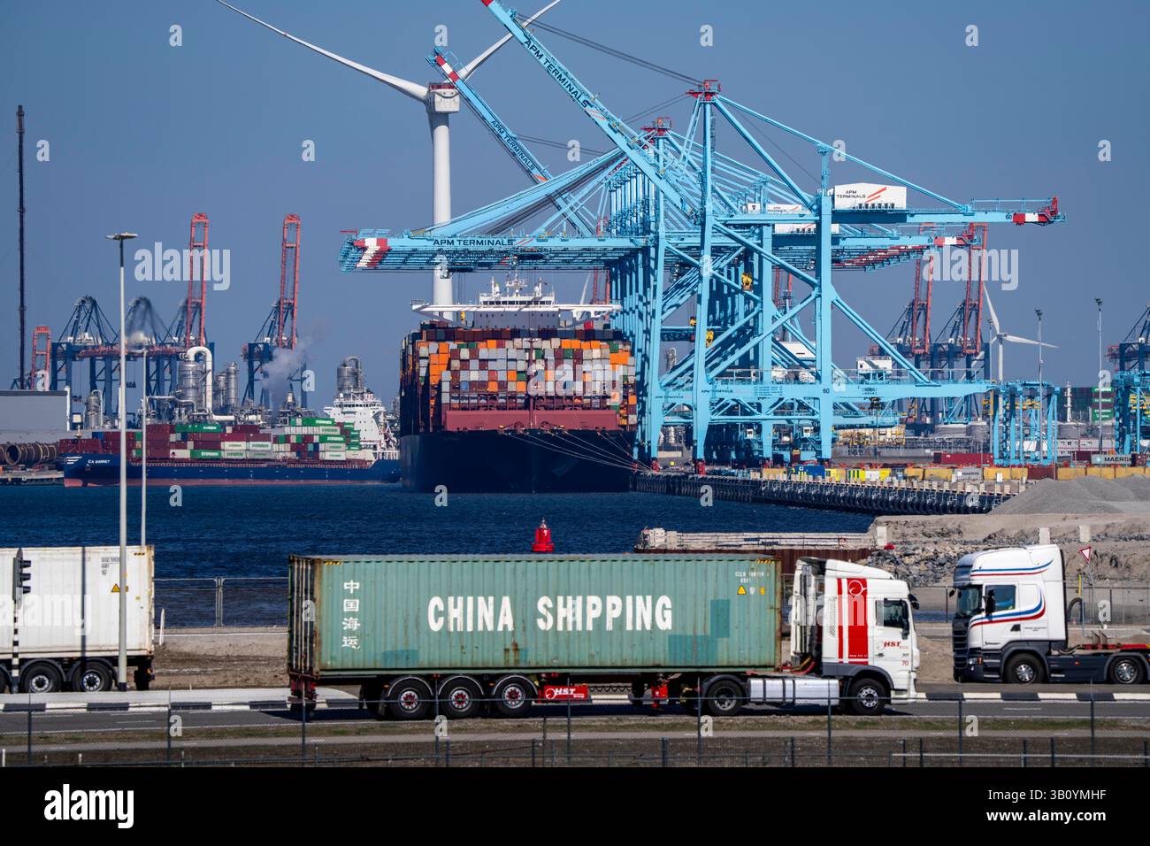 APM Container Terminal, container freighter being loaded and unloaded, container trucks ...