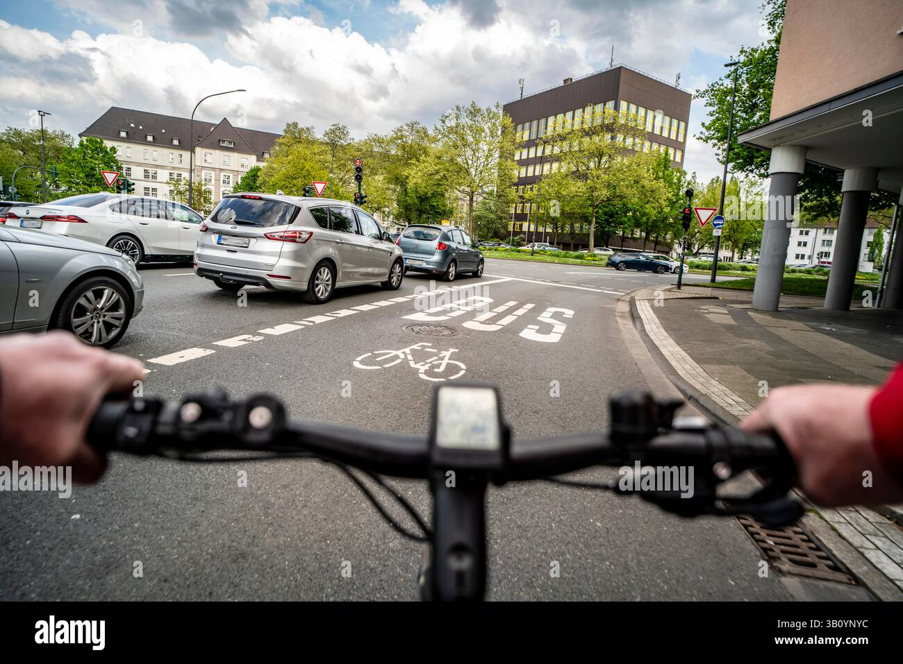 Cycling in the city, inner-city road, cyclists allowed to use bus lane ...