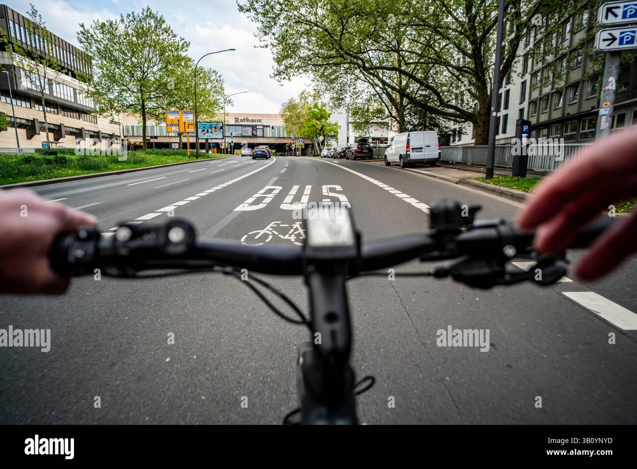Cycling in the city, inner-city road, cyclists allowed to use bus lane ...