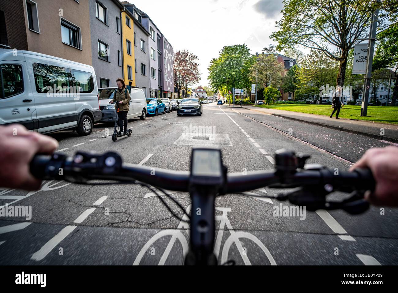 Cycling in the city, inner-city road, cycle lane, bicycles have right ...