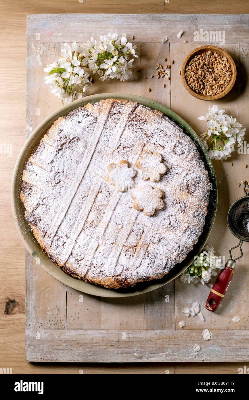 Traditional homemade pie Pastiera Napolitano dusted with powdered sugar ...