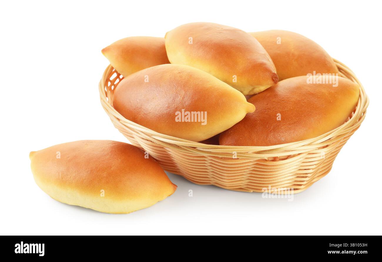 Tasty baked patties in basket isolated on white Stock Photo - Alamy