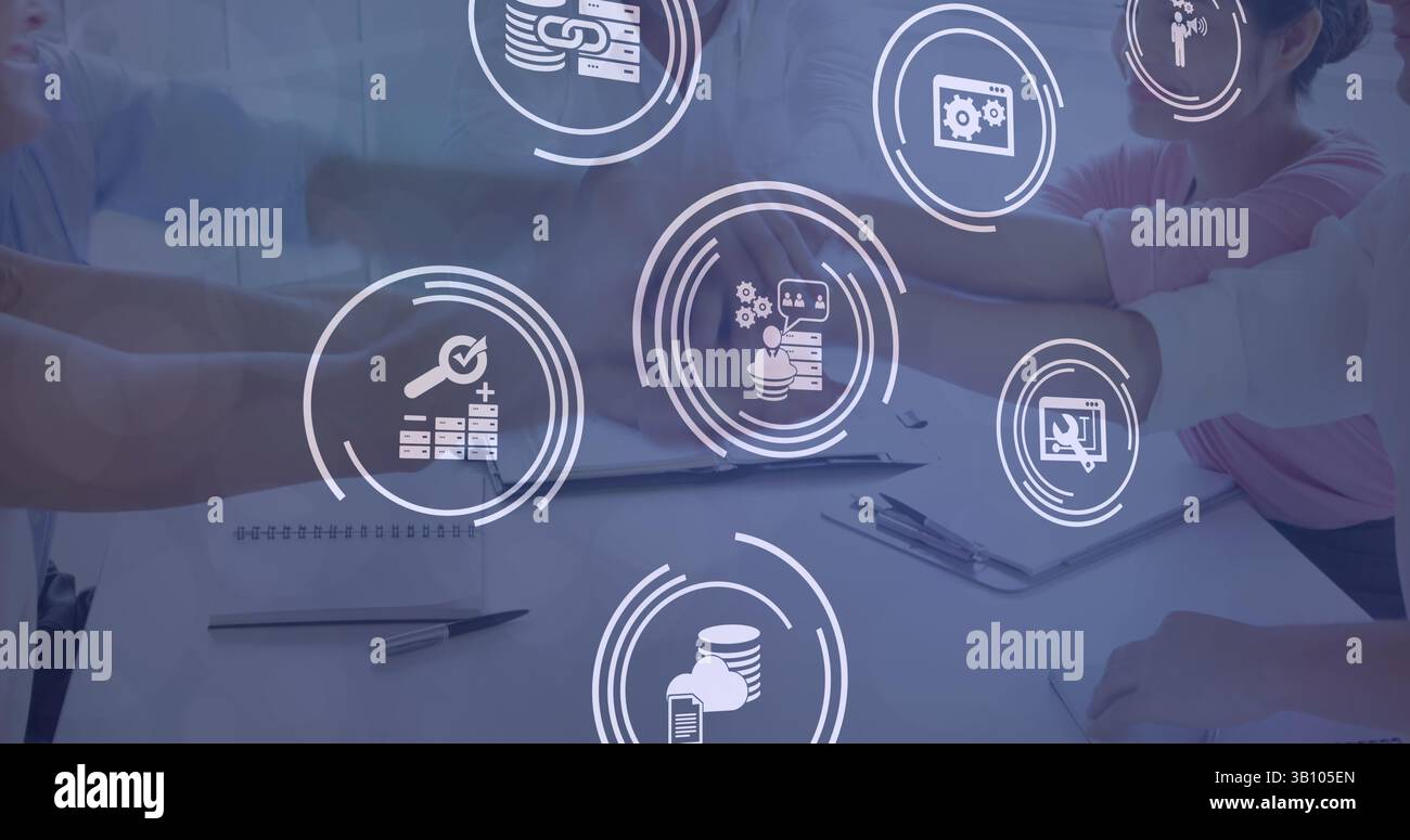 Multiple digital icons against group of diverse office colleagues ...