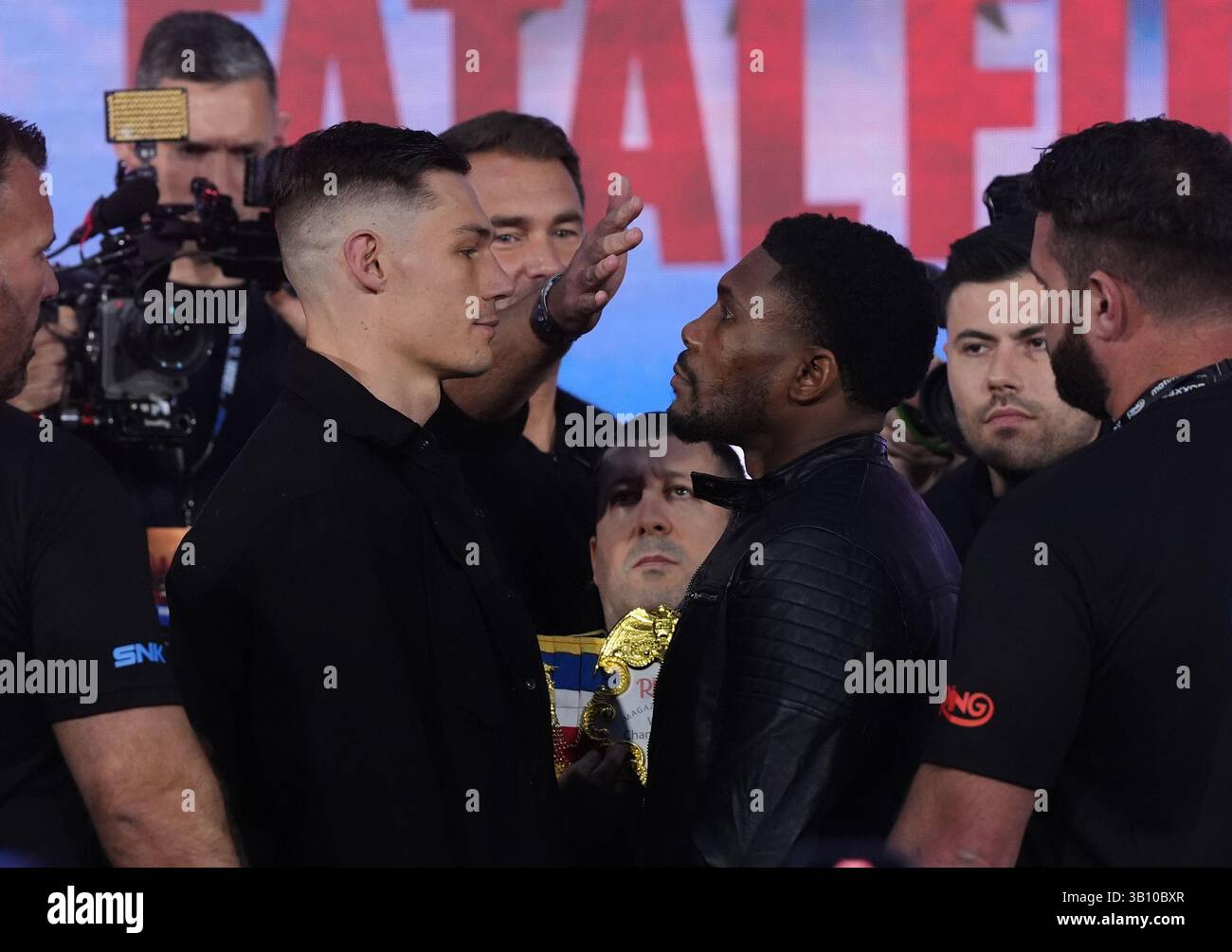 Chris Billam-Smith (left) and Brandon Glanton face-off during a press ...