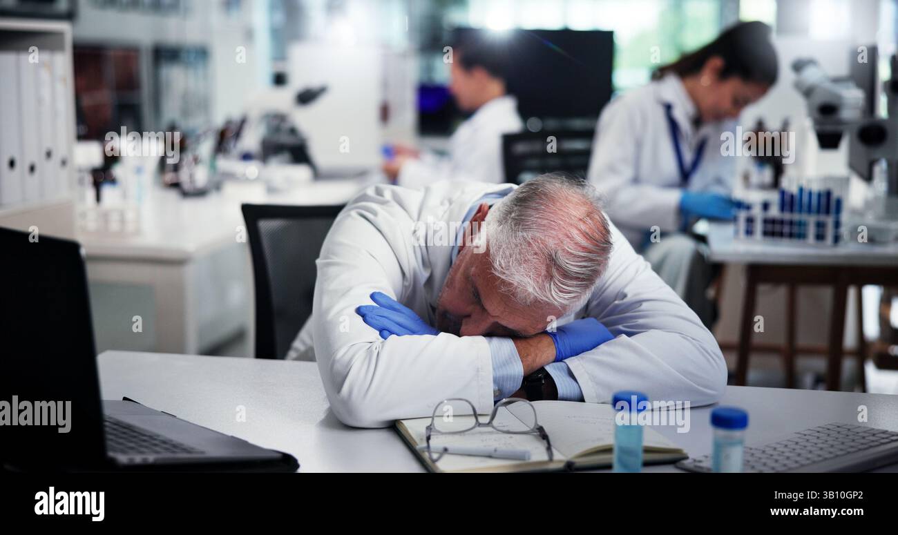 Tired, scientist and man sleeping in laboratory for burnout, deadline ...
