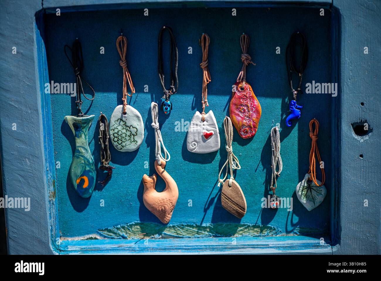 A captivating display of ancient Middle Eastern necklaces featuring ...