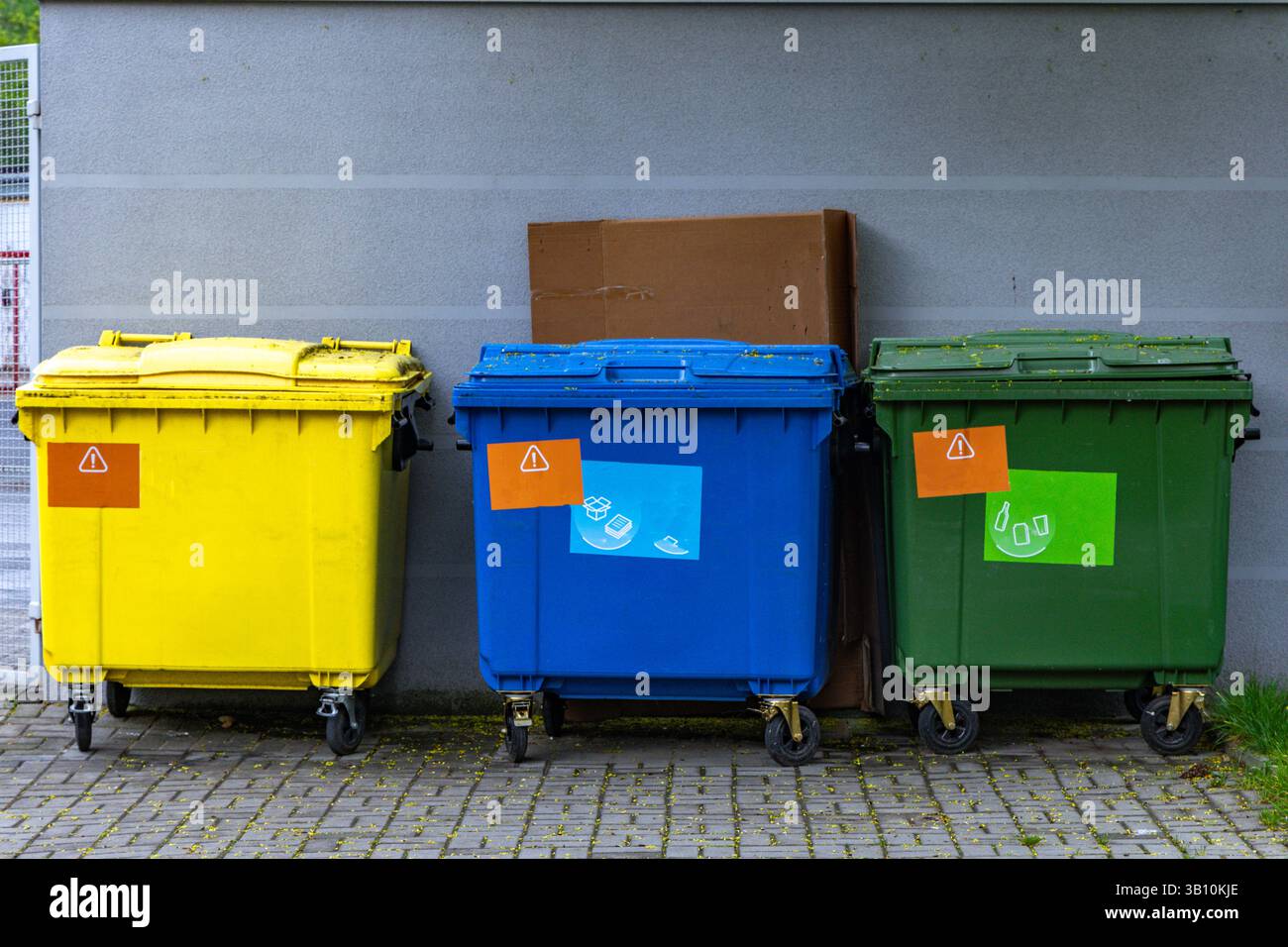 Colored garbage cans, waste segregation, paper, glass, bio-waste Stock ...