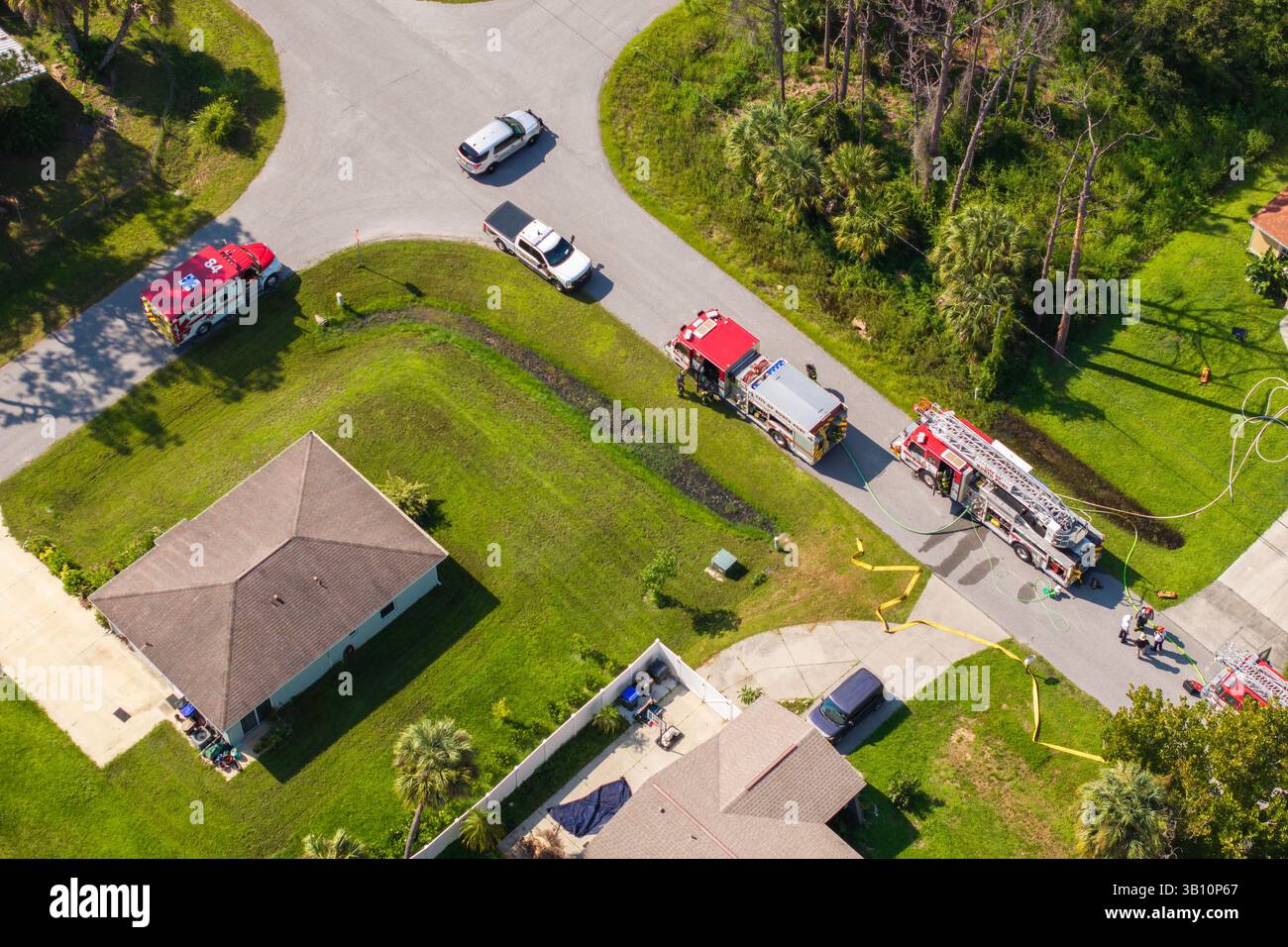 Fire engine trucks and ambulance vehicles responding to fire alarm ...