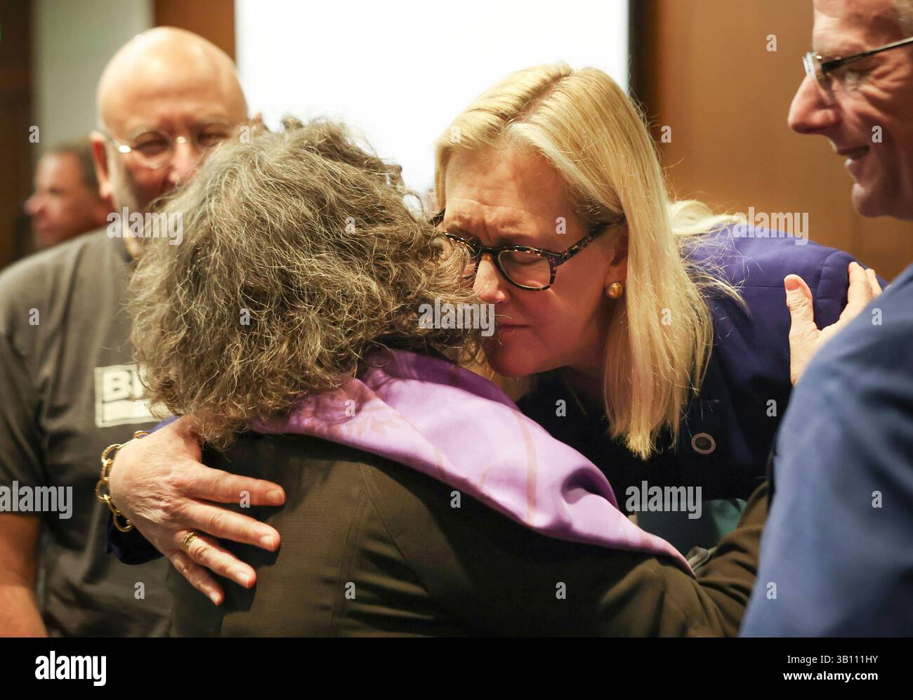 Highland Park Mayor Nancy Rotering hugs shooting survivor Erica Weeder ...