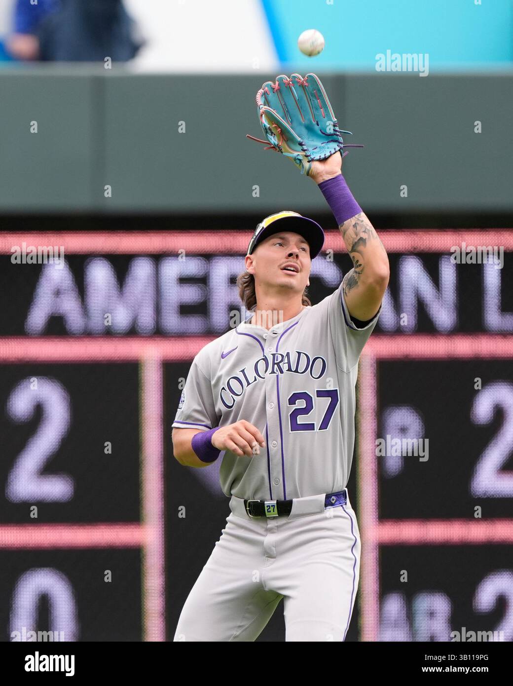 Colorado Rockies left fielder Jordan Beck catches a fly ball for the ...