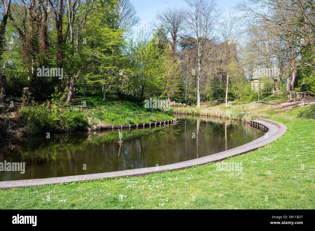 Garden and water pond of the Vanackere castle in Wevelgem, West Flanders, Belgium, 11 April 2025 ...