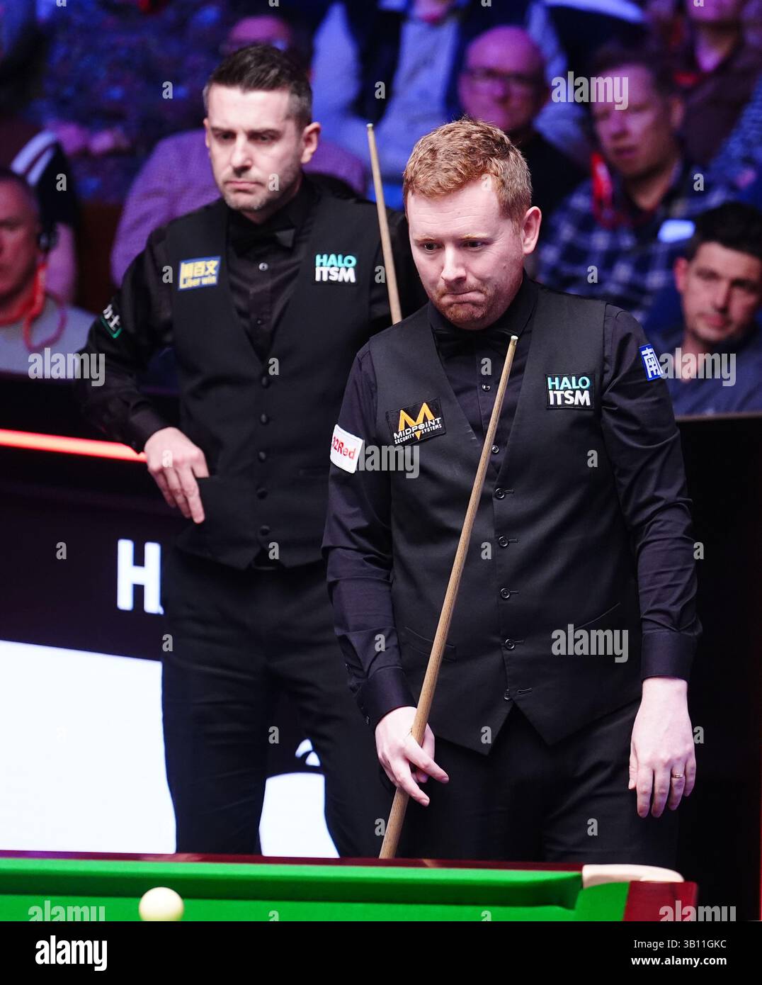 Ben Woollaston (right) during his match with Mark Selby (left) on day ...