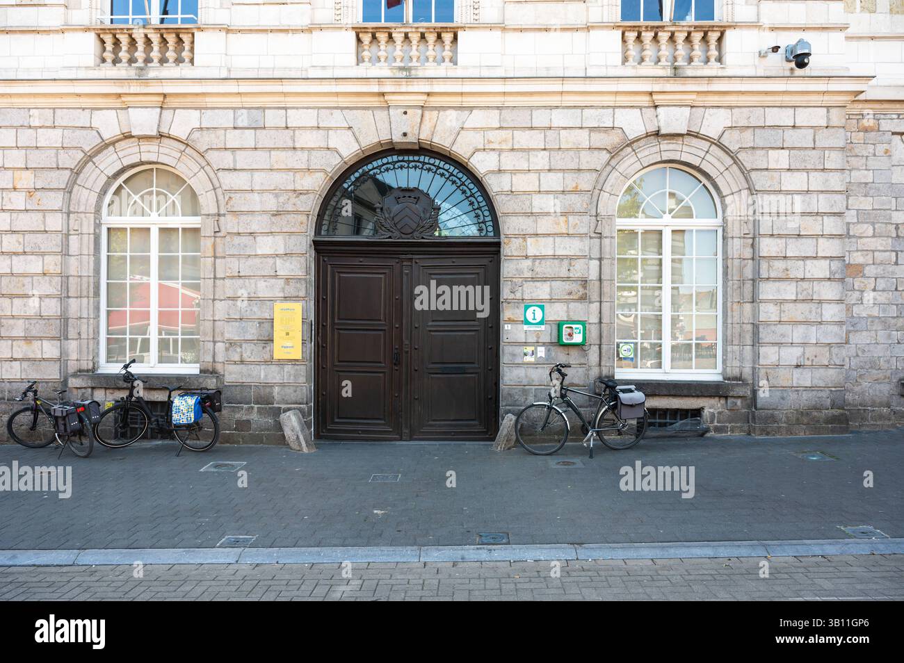Town hall and square in the village of Menen, West Flanders, Belgium ...