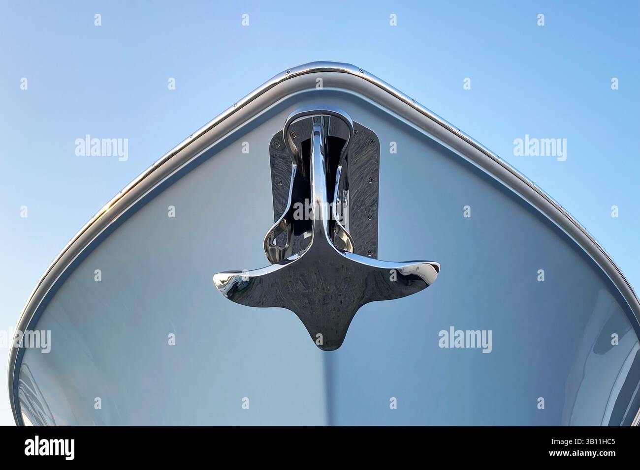 Anchor on cape of the ship close up, luxury yacht leisure motor boat ...