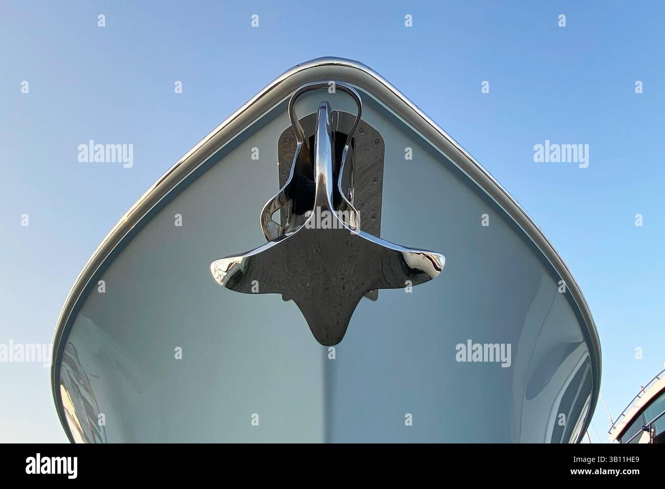 Anchor on cape of the ship close up, luxury yacht leisure motor boat ...