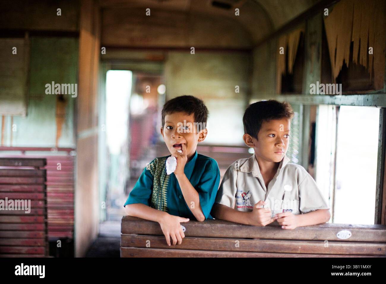 Jul. 01, 2006 - Phnom Penh, Cambodia - Boys ride the Phnom Penh - Battambang passenger train ...