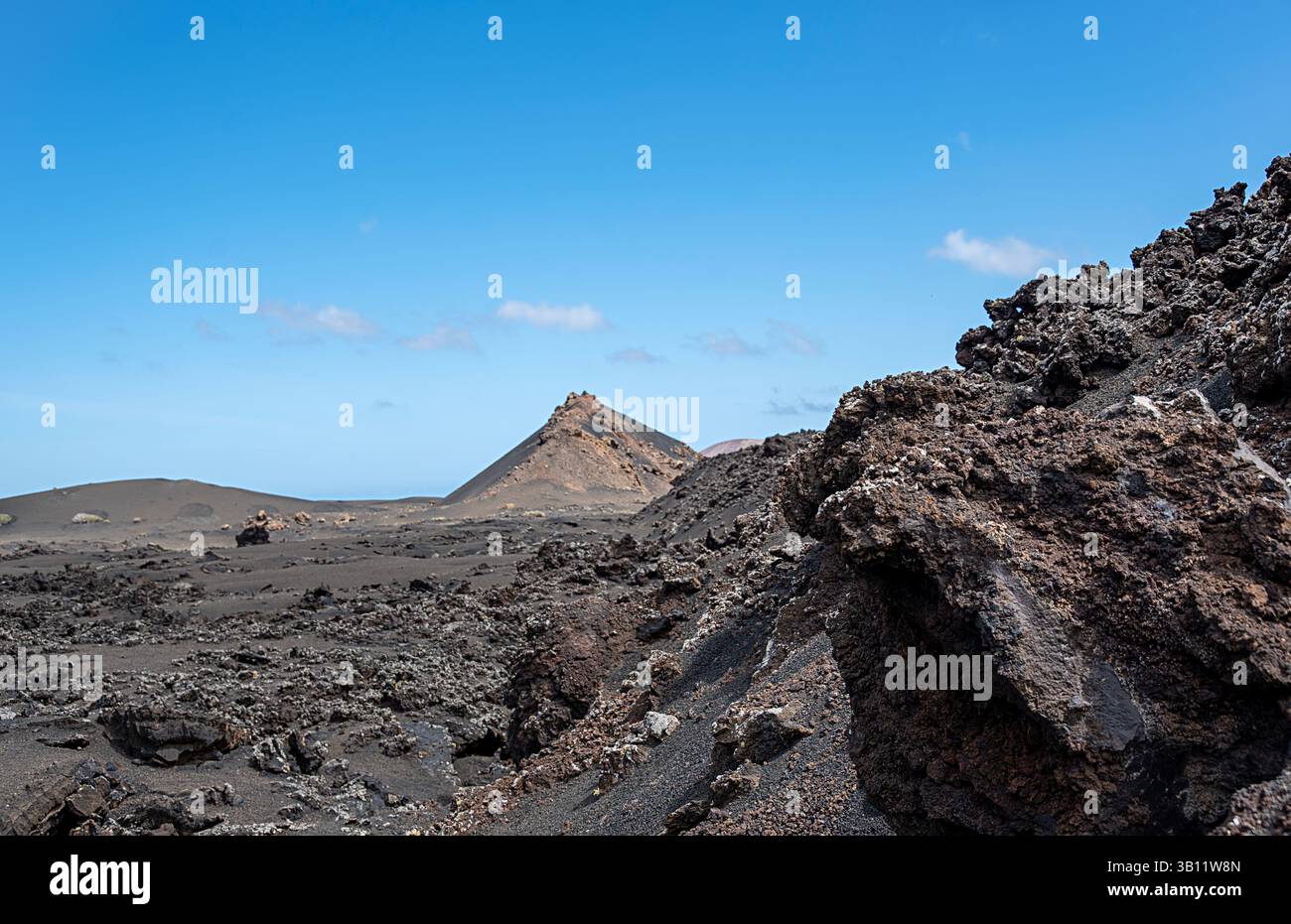 Landscape photography of mountain and desert with volcanic stones ...