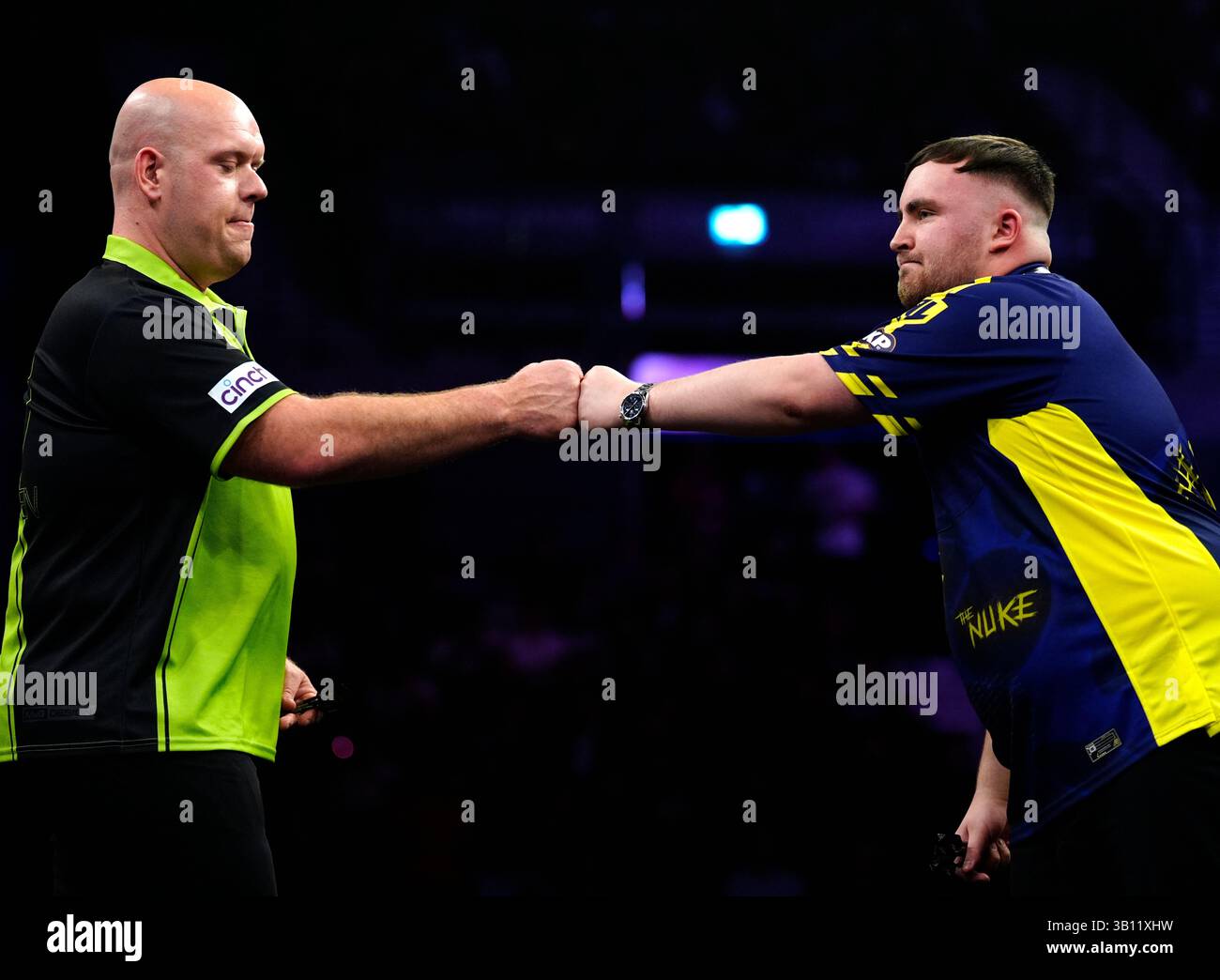 Michael van Gerwen (left) celebrates victory against Luke Littler ...