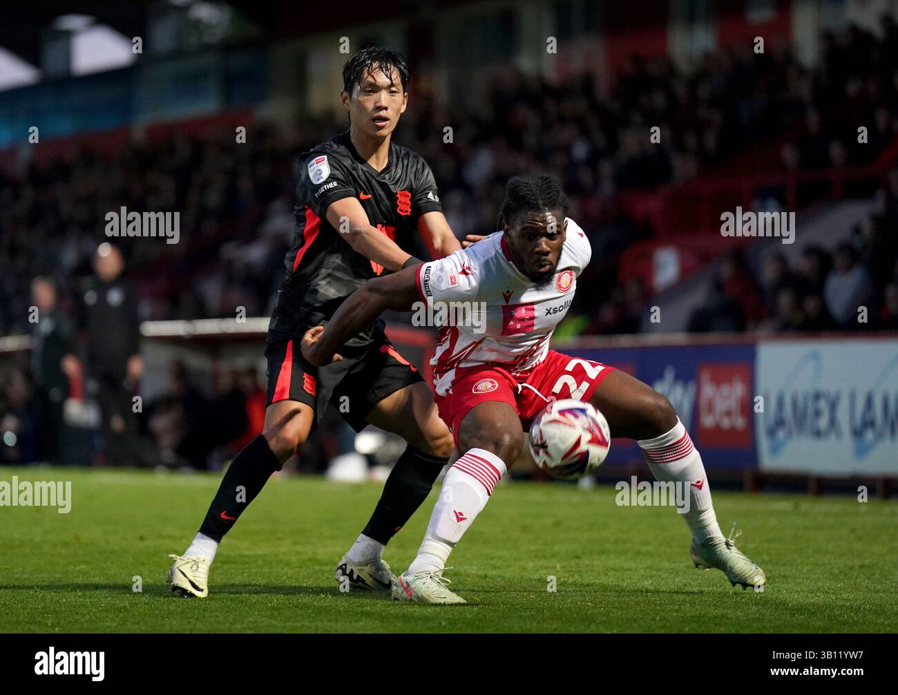 Birmingham City's Myung-Jae Lee (left) and Stevenage's Daniel Phillips ...