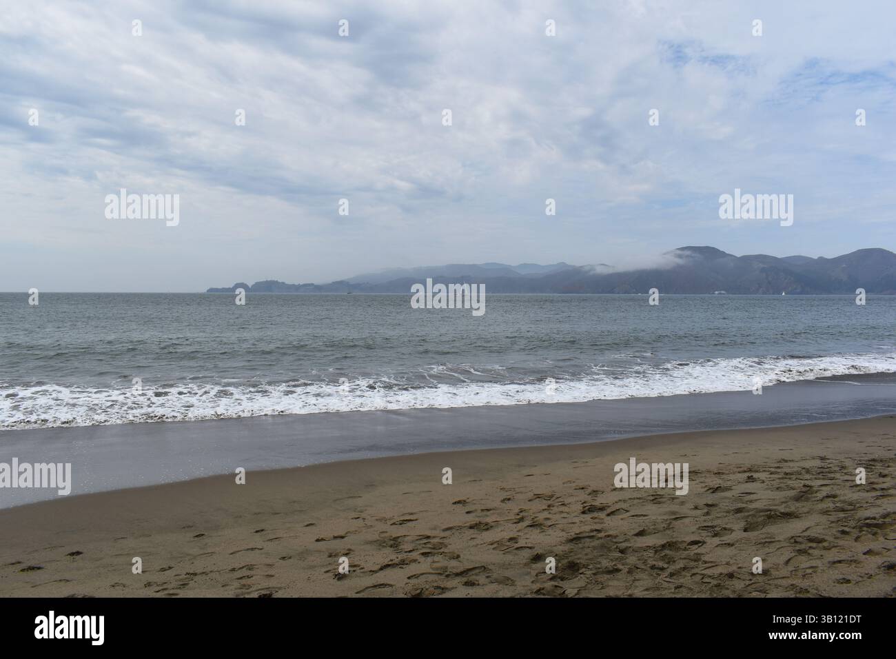 Summer shoreline with calm ocean waves, tropical beach view, clear sky ...