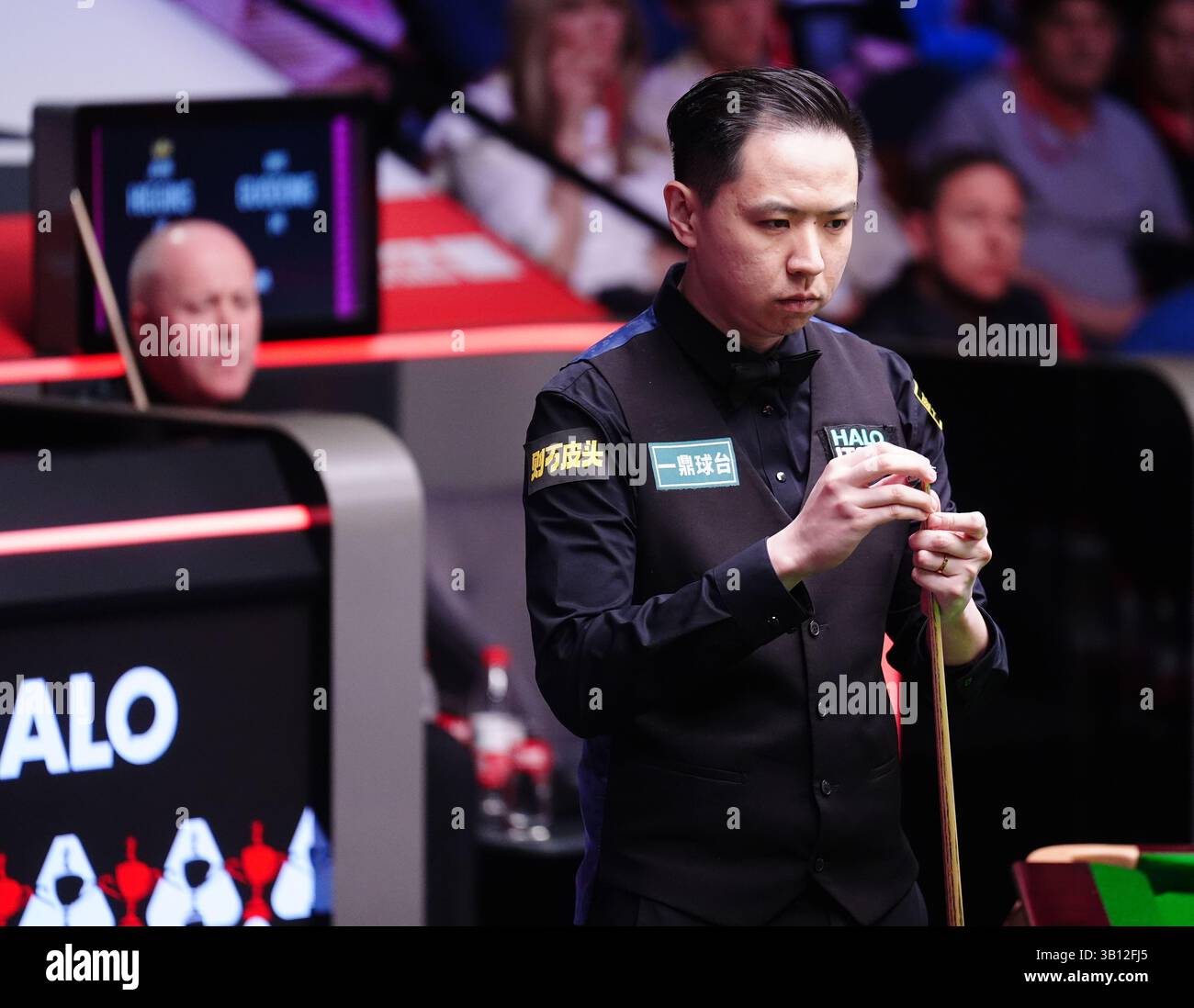 Xiao Guodong during his match with John Higgins on day six of the Halo ...
