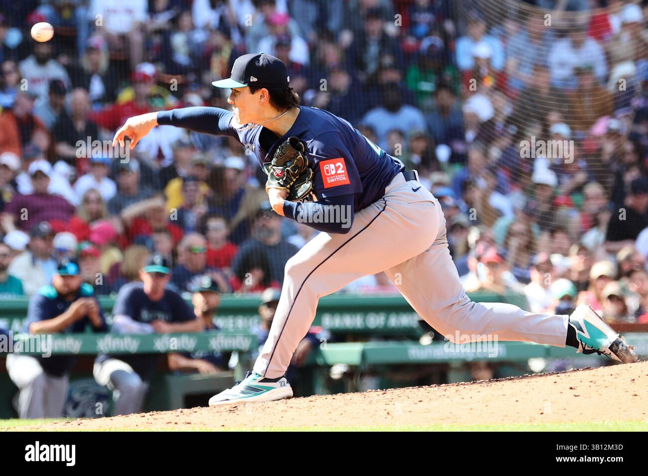 Seattle Mariners pitcher Bryan Woo delivers from the mound during the ...