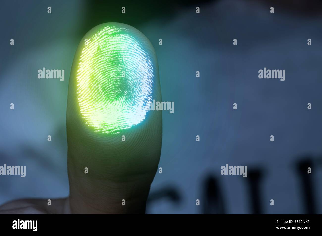 Colorful fingerprint remaining on surface while woman pressing her ...