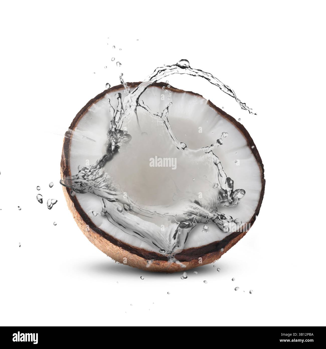 Coconut water splashing out of nut on white background Stock Photo - Alamy