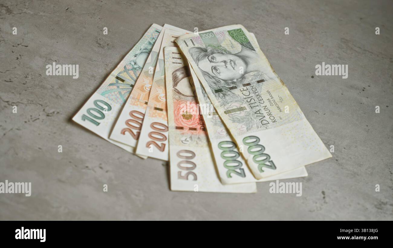 Czech banknotes of various denominations including 100, 200, 500, and ...