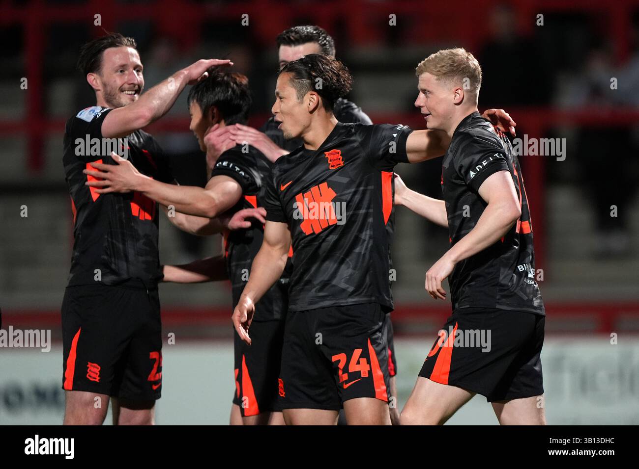 Birmingham City's Alex Cochrane (right) celebrates with team-mates ...