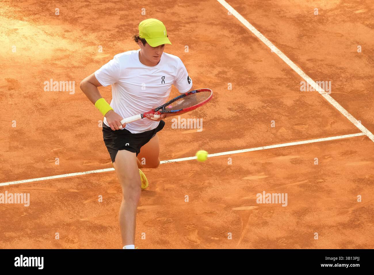 Joao Fonseca of Brazil in action against Elmer Moller the Mutua Madrid ...