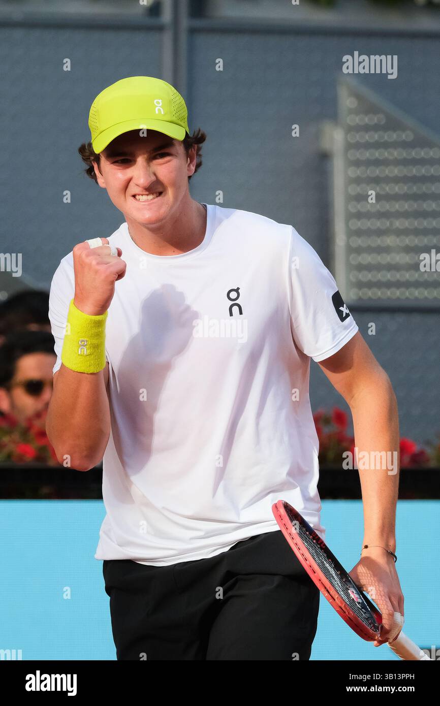 Joao Fonseca of Brazil in action against Elmer Moller the Mutua Madrid ...