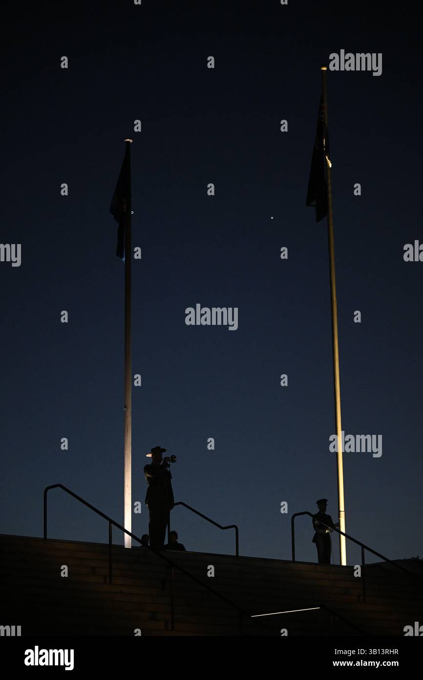 Canberra, Australia. 25th Apr, 2025. The bugler plays the last post ...