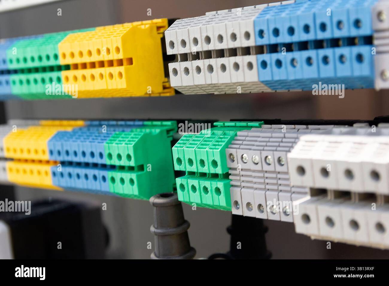 New terminal blocks located on a DIN rail at the exhibition stand ...