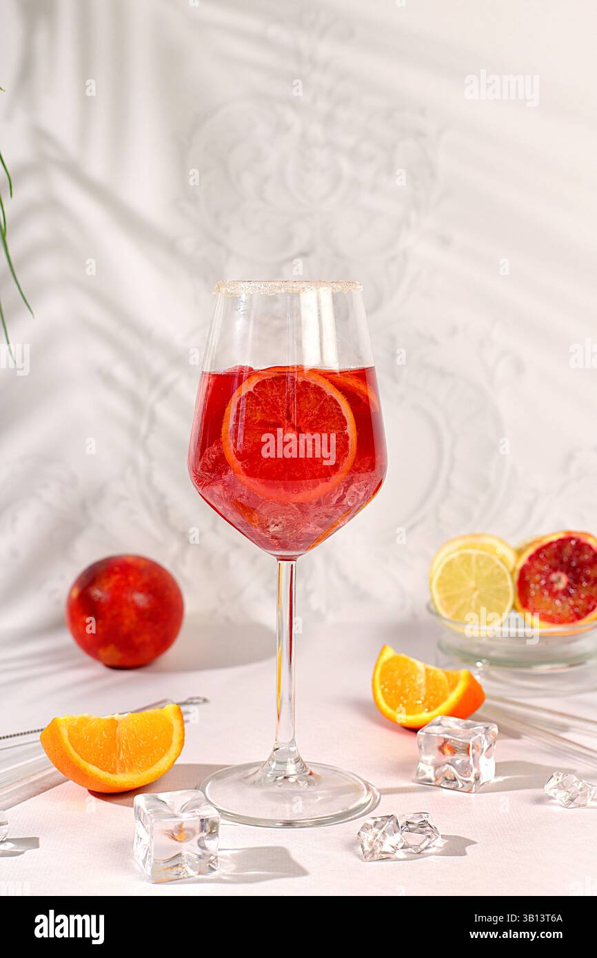 Royal cocktail aperol sprits with blood orange, ice cubes, rum and ...
