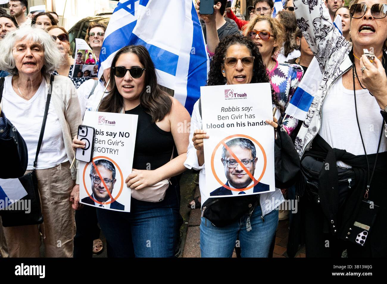 New York City, United States. 24th Apr, 2025. People holding signs at a ...