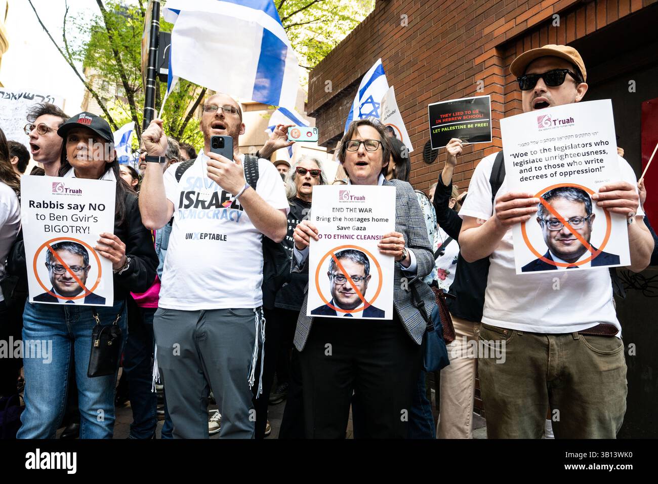New York City, United States. 24th Apr, 2025. People holding signs at a ...
