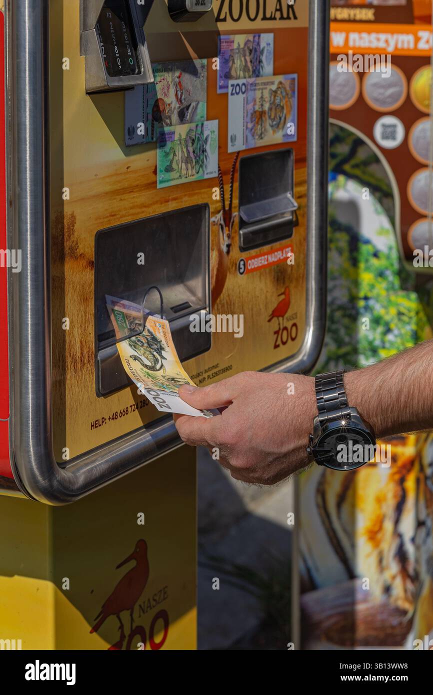 Wroclaw, Poland- April 4, 2025: Man collecting colorful souvenir ...