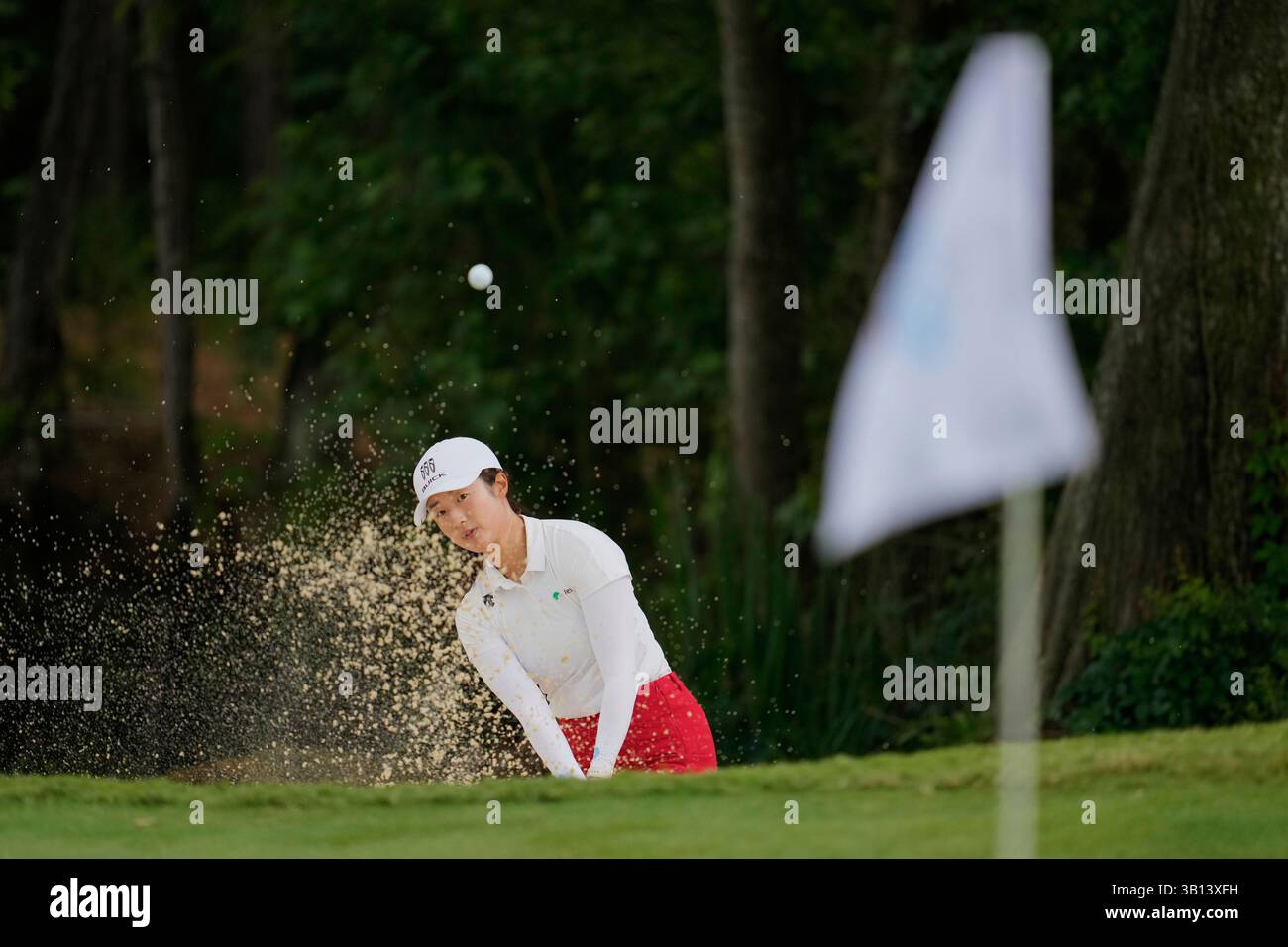 Yu Liu, of China, hits on the 17th hole during the first round of the ...