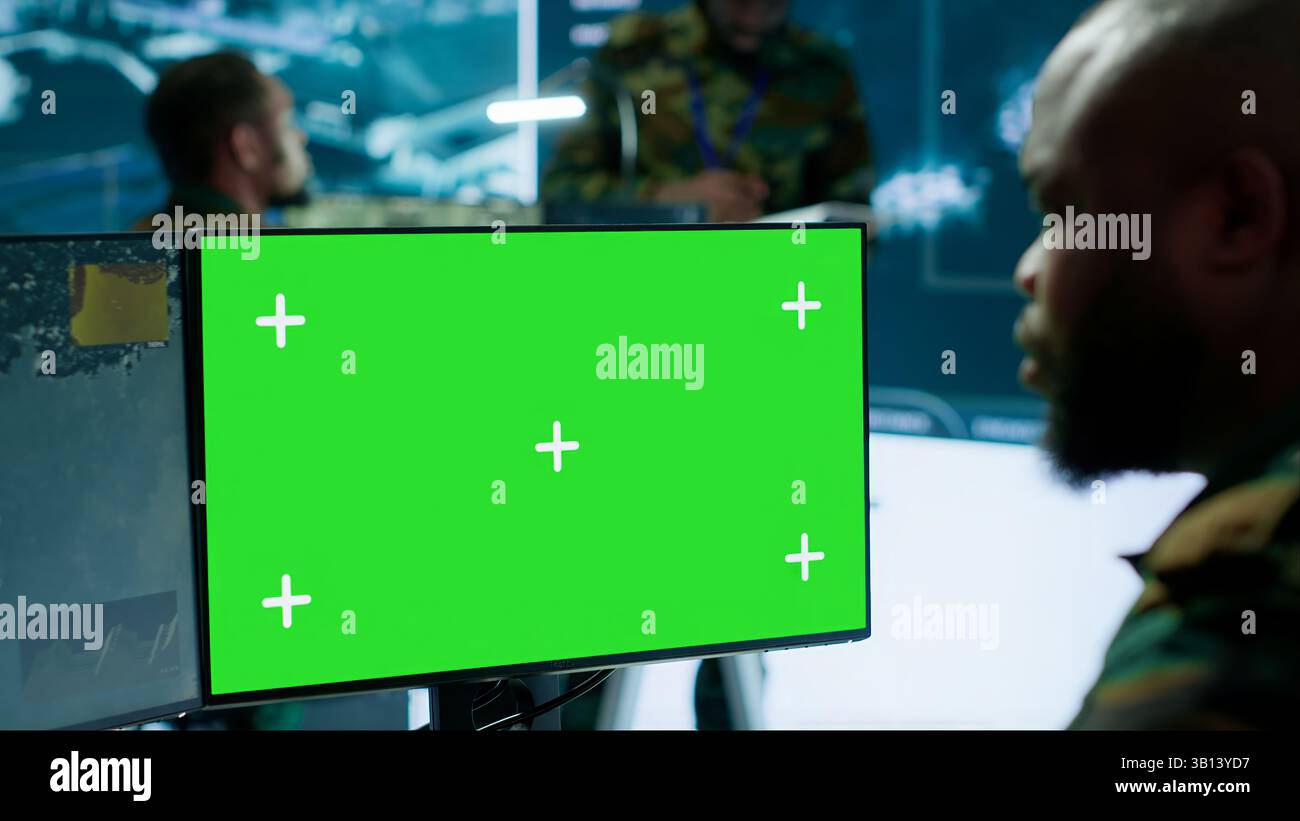 Army IT expert in control center collecting real time battlefield data ...
