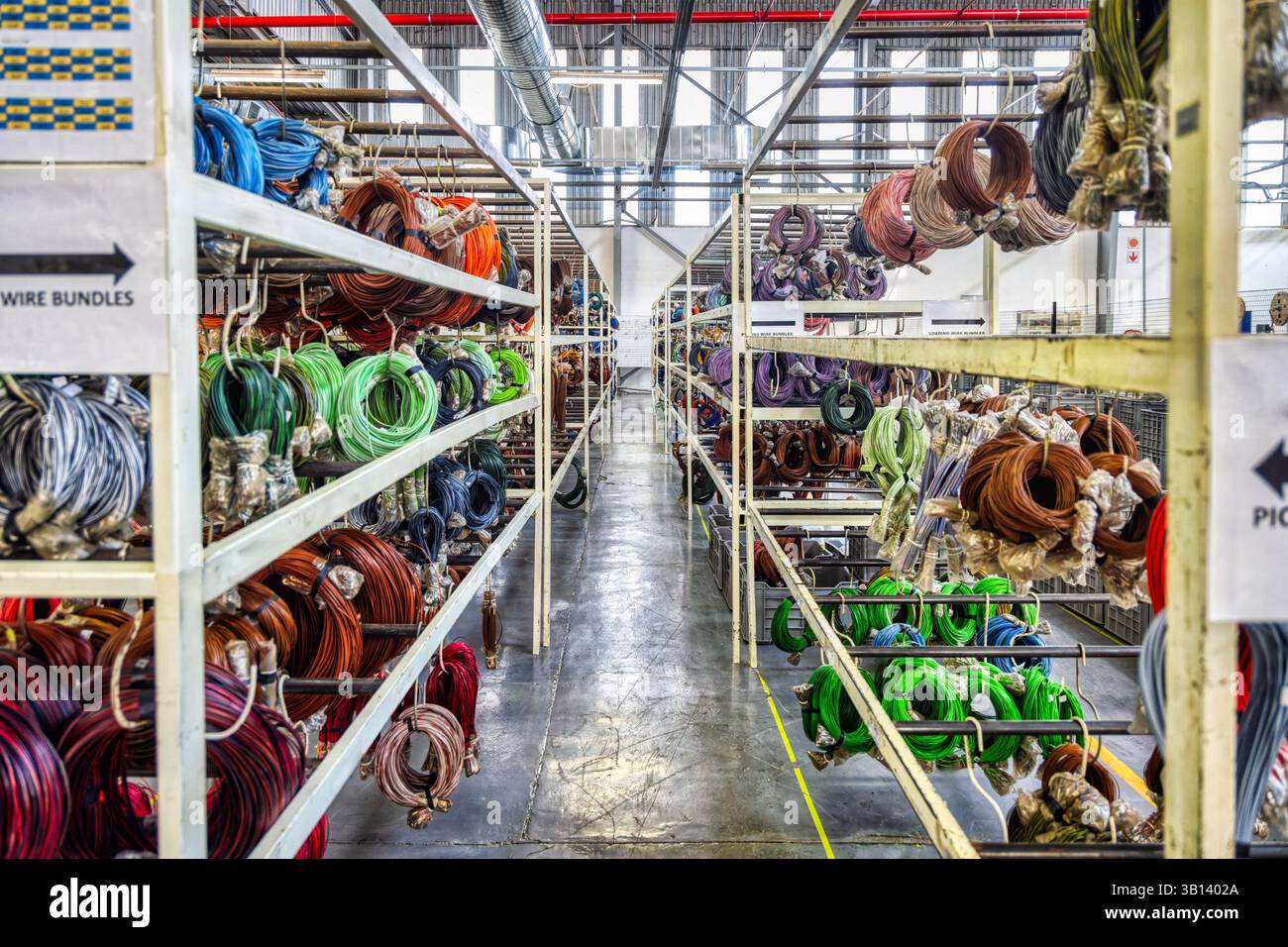 car wire harness factory, wiring cable packed on industrial shelves ...