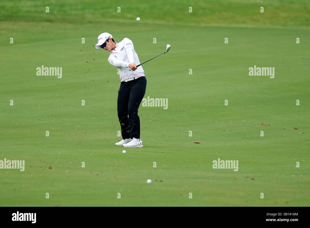 Narin An, of South Korea, hits on the 18th hole during the first round ...