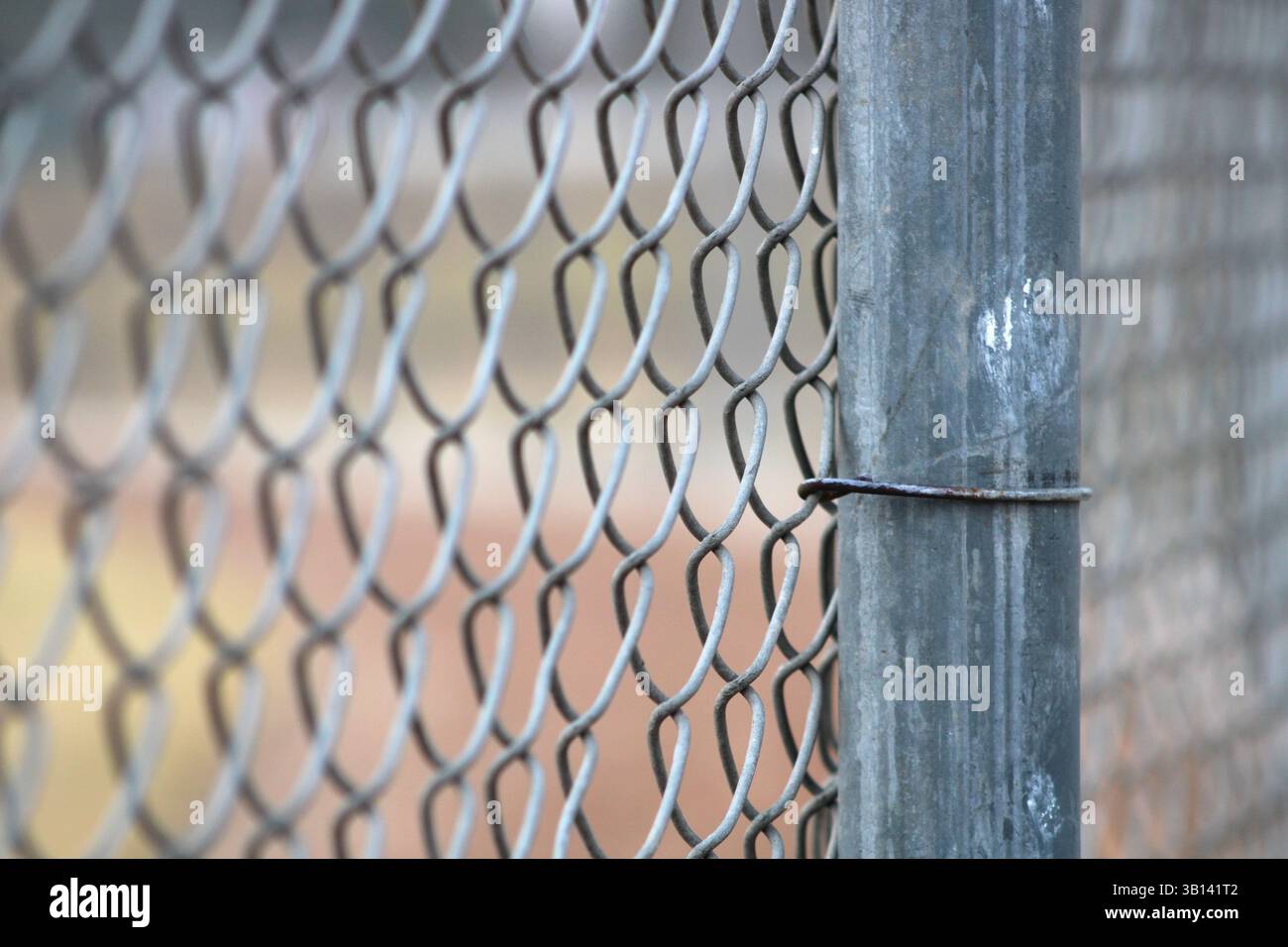 chainlink metal silver baseball fence Stock Photo - Alamy