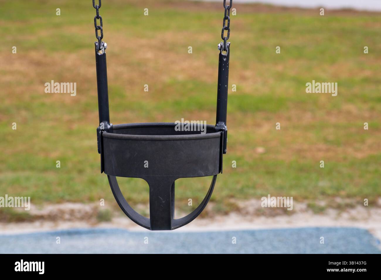 swings at park playground for kids Stock Photo - Alamy