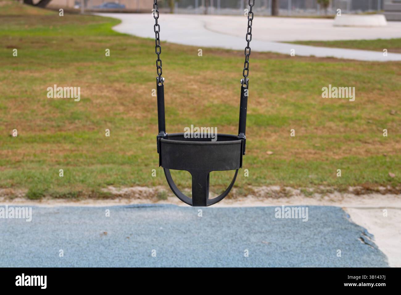 Outdoor playground swings hi-res stock photography and images - Alamy