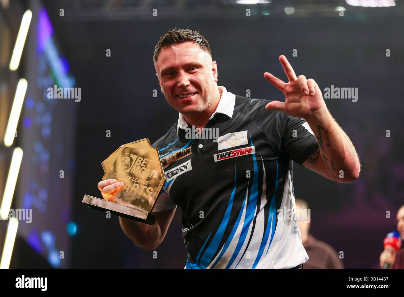 Liverpool, UK. 24th Apr, 2025. Gerwyn Price celebrates winning with the ...