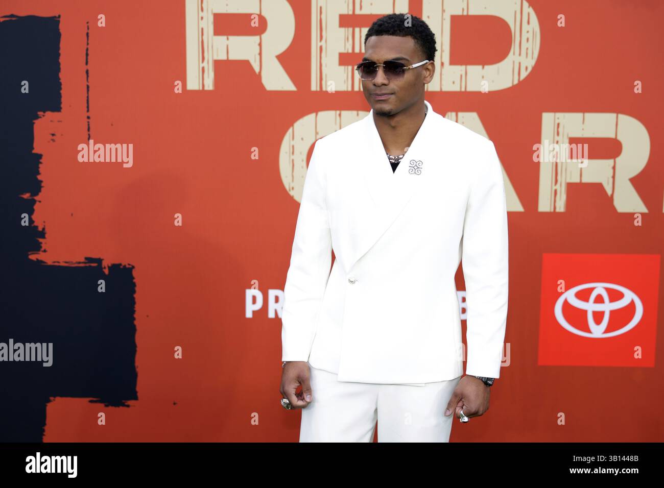 Michigan defensive back Will Johnson poses on the carpet before first ...