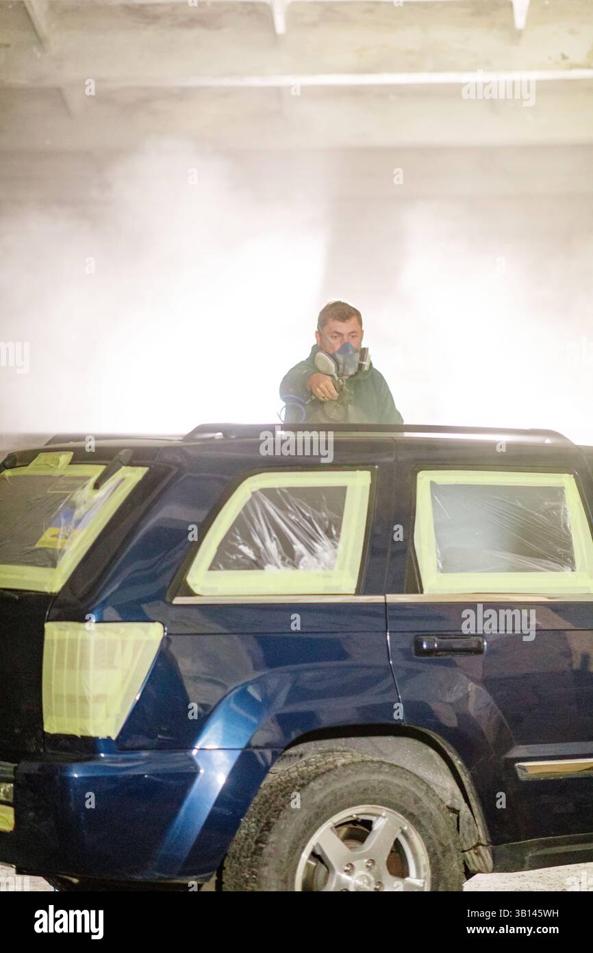 Individual wearing mask stands hi-res stock photography and images - Alamy